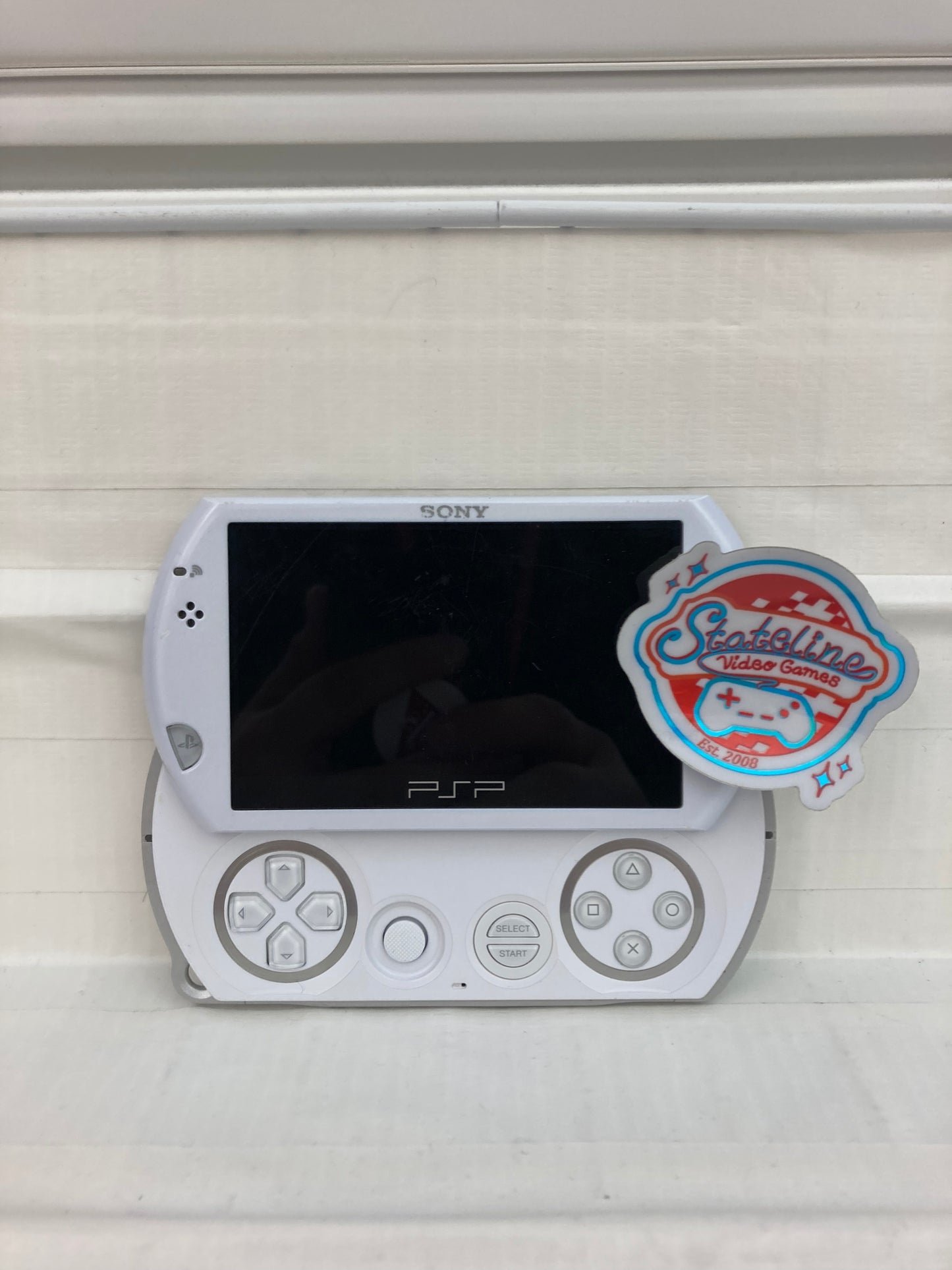 PSP Go Pearl White - PSP – Stateline Video Games Inc.
