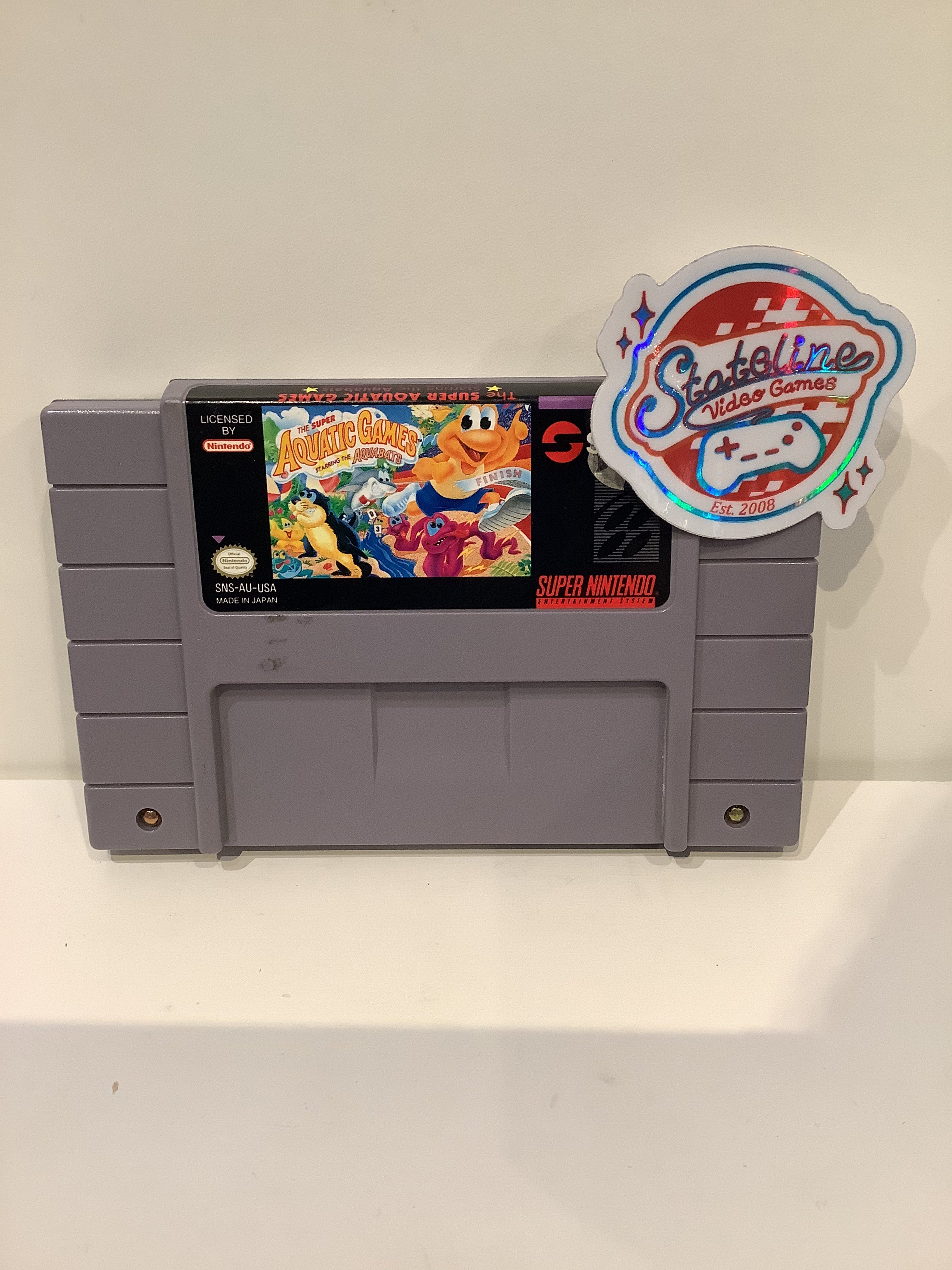 Super Aquatic Games - Super Nintendo – Stateline Video Games Inc.