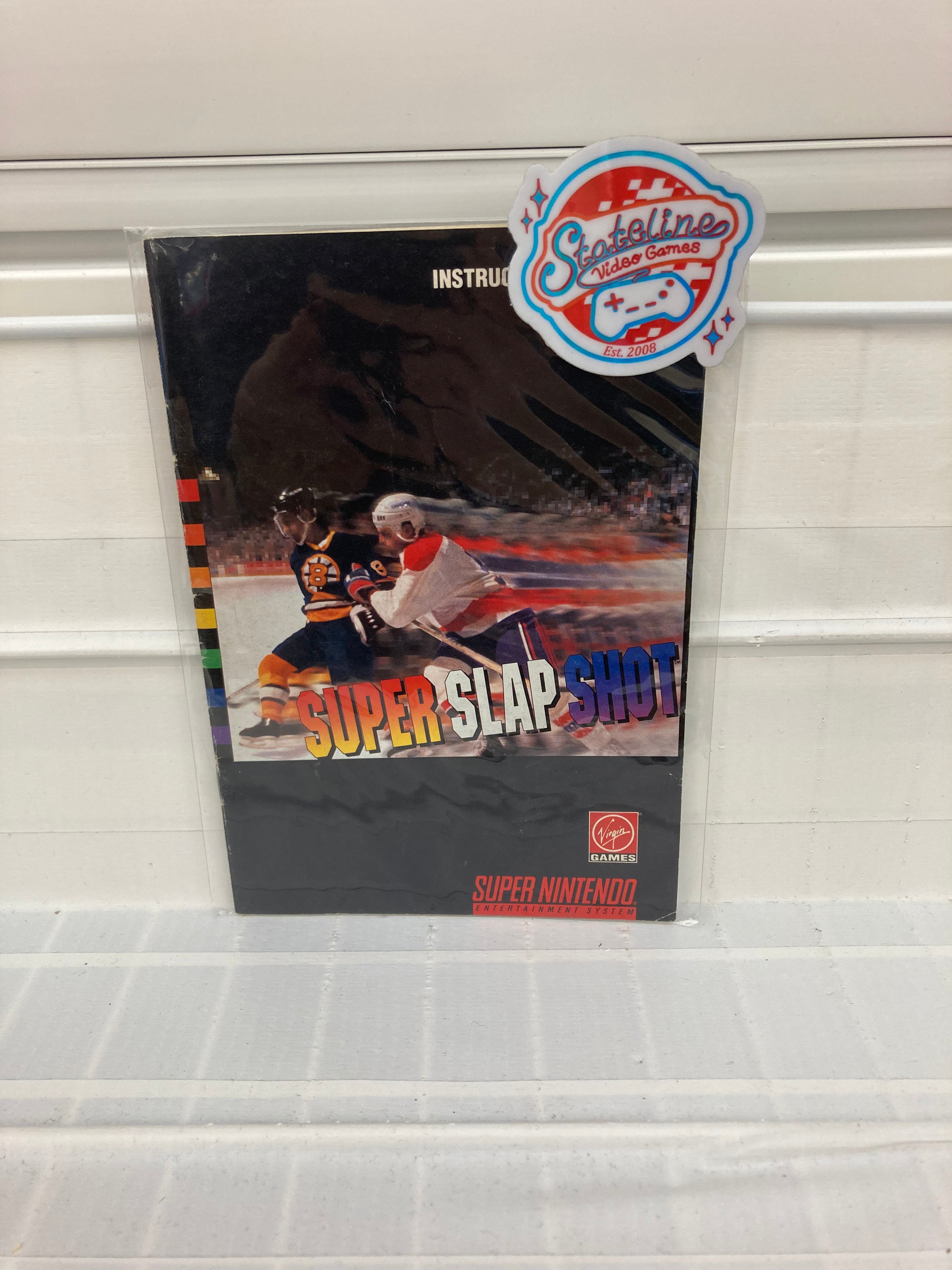 Super Slap Shot - Super Nintendo – Stateline Video Games Inc.